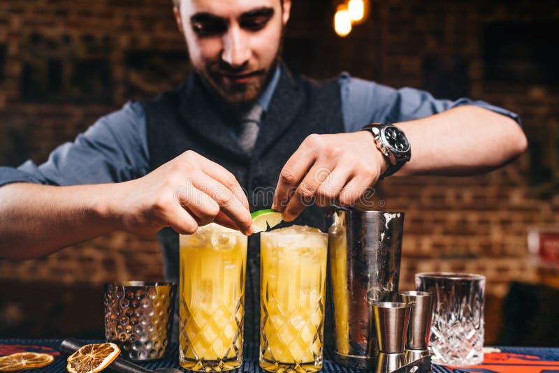 Professional Barman Garnishing with Lime Cocktails Stock Photo - Image ...