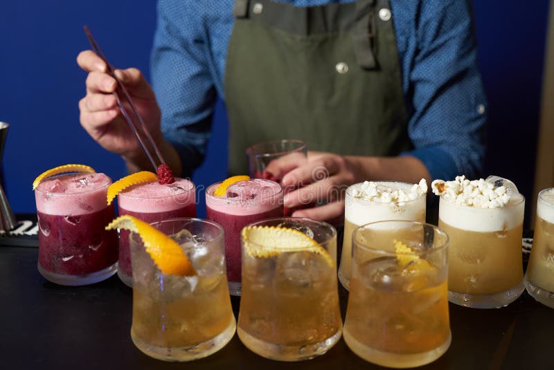 Professional Bartender Is Making Fresh Cocktail At Bar Counter Stock ...