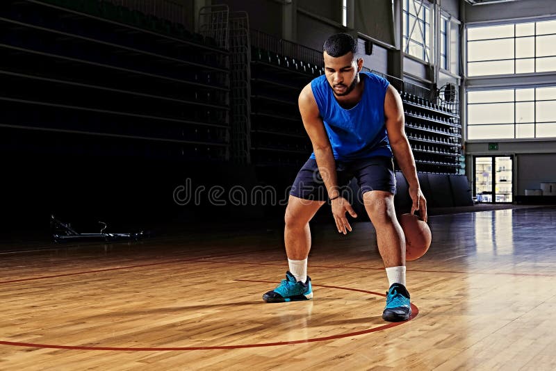 Professional Basketball Player in Action on a Basketball Field. Stock ...