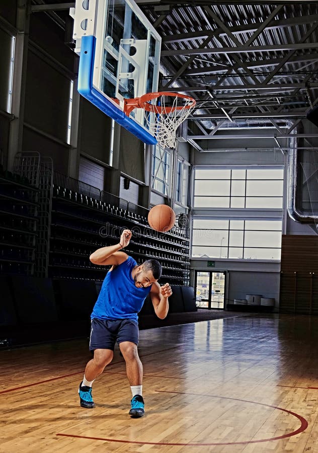 Professional Basketball Player in Action on a Basketball Field. Stock ...
