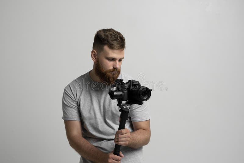 Professional Bearded Videographer Holding Camera Which Set on 3-axis ...