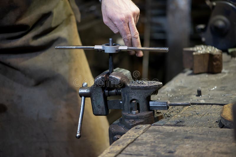 Professional Blacksmith Working with Metal at Forge, Workshop. Handmade ...