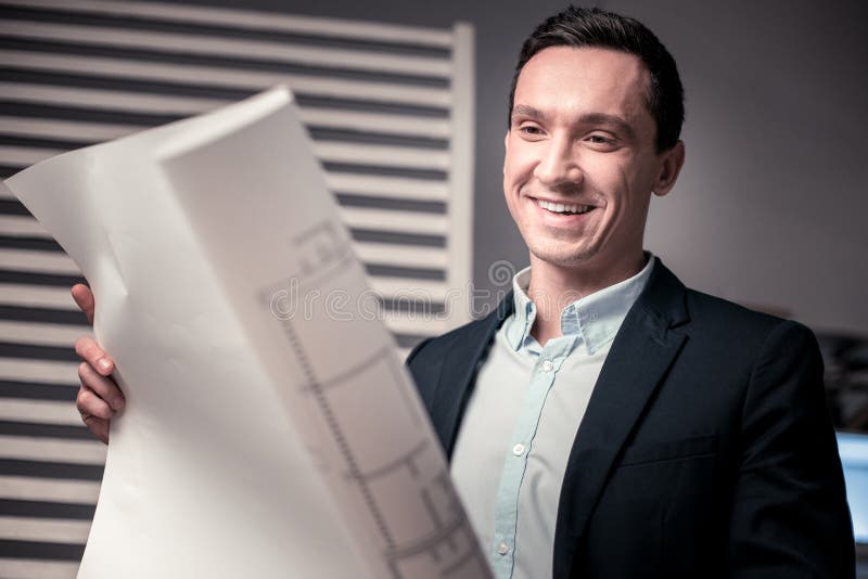 Delighted Professional Engineer Looking at the Drawing Stock Image ...