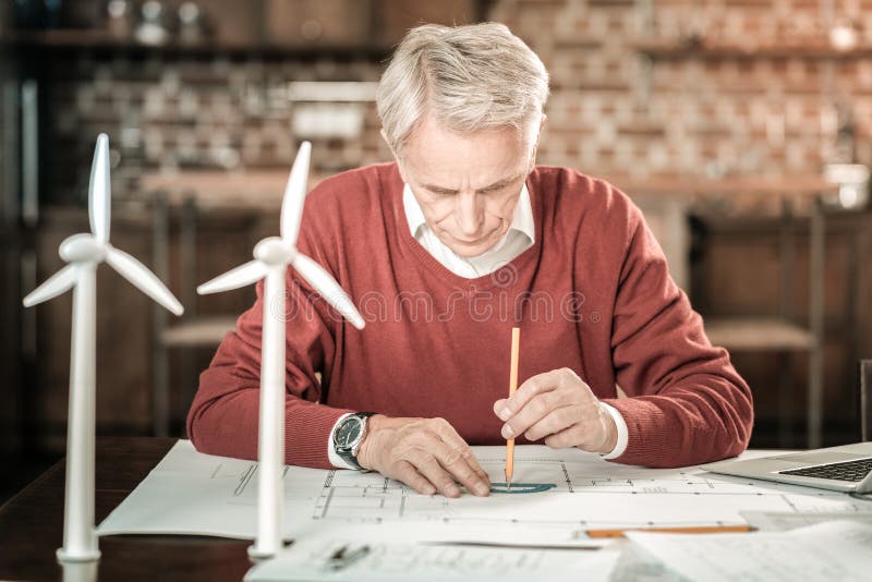 Serious Smart Man Working on a Drawing Stock Photo - Image of ...