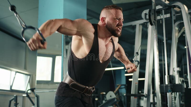 Professional Bodybuilder Training Chest Muscles Using Cross Over ...