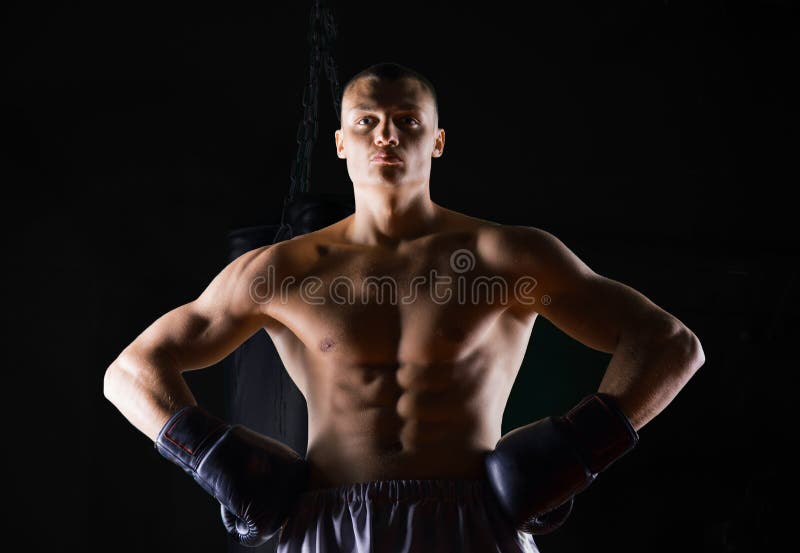 The Professional Boxer Stands in the Fighting Stance Stock Photo ...