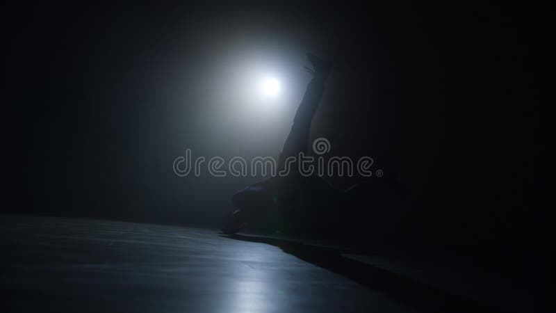Professional Break Dancer Dancing on a Stage with Spotlight in the ...
