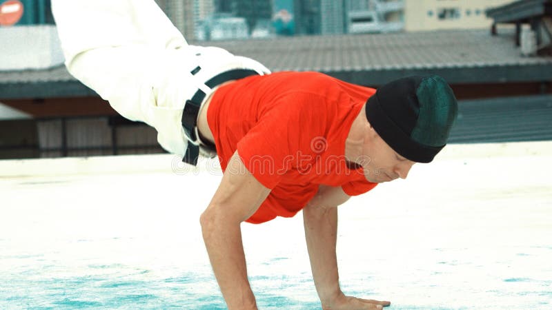 Professional Break Dancer Doing Head Spin at Roof Top with City View ...