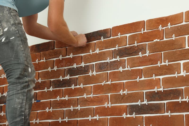 Professional Builder Gluing Decorative Brick on Wall, Closeup. Tiles ...