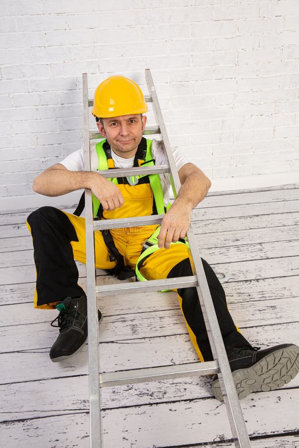 A Professional Builder with a Ladder, Compact and Ready To Work at Any ...