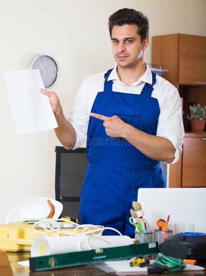 Professional Builder Preparing for Call in Design Office Stock Image ...