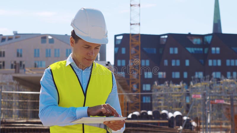 Professional Builder Standing in Front of Construction Site. Foreman in ...