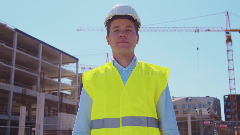Professional Builder Standing in Front of Construction Site. Foreman in ...