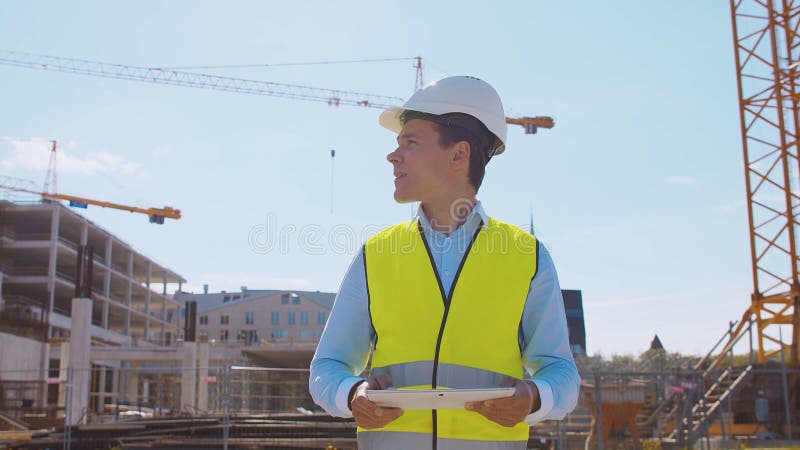 Professional Builder Standing in Front of Construction Site. Foreman in ...