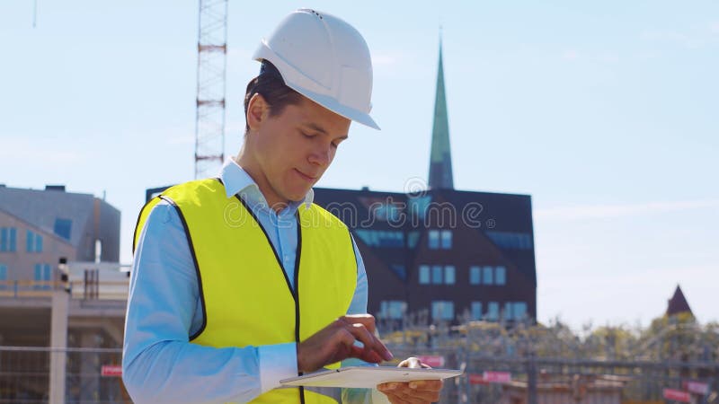 Professional Builder Standing in Front of Construction Site. Foreman in ...