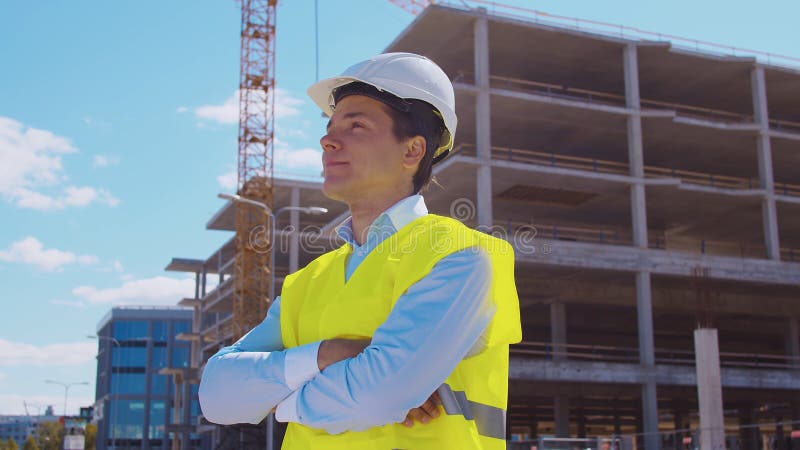 Professional Builder Standing in Front of Construction Site. Foreman in ...