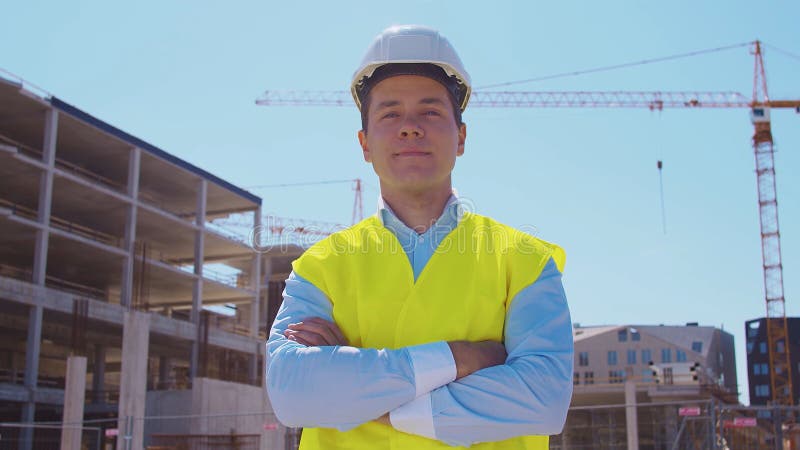 Professional Builder Standing in Front of Construction Site. Foreman in ...