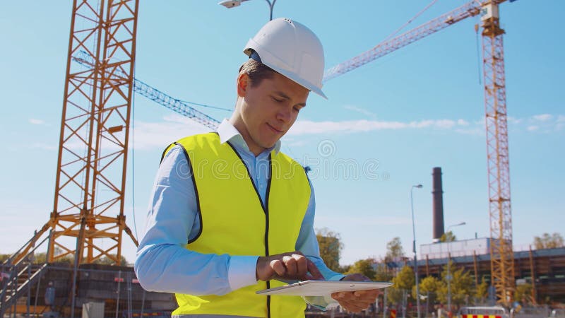 Professional Builder Standing in Front of Construction Site. Foreman in ...