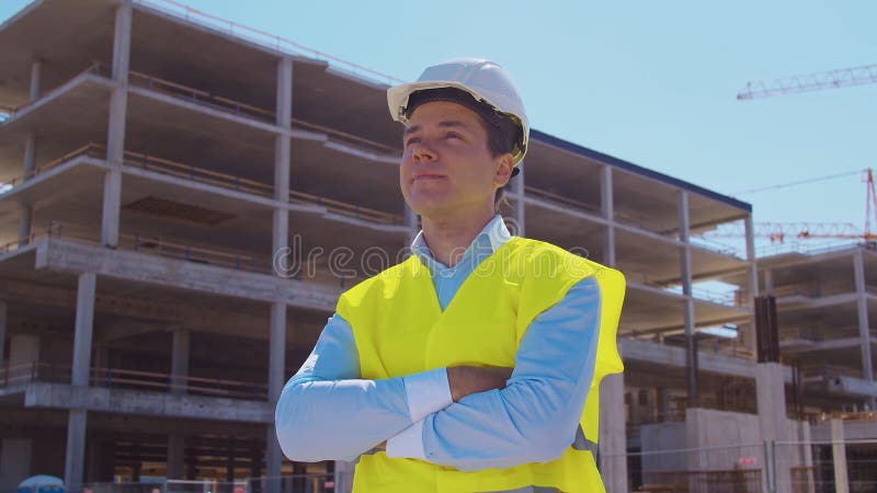 Professional Builder Standing in Front of Construction Site. Foreman in ...