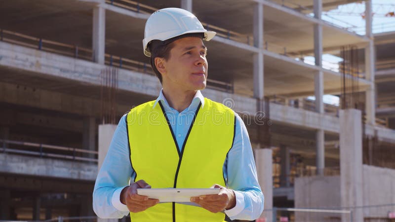 Professional Builder Standing in Front of Construction Site. Foreman in ...