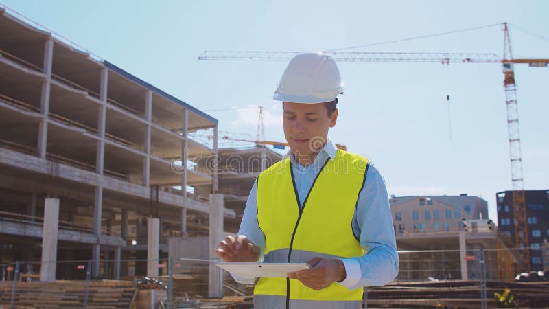 Professional Builder Standing in Front of Construction Site. Foreman in ...