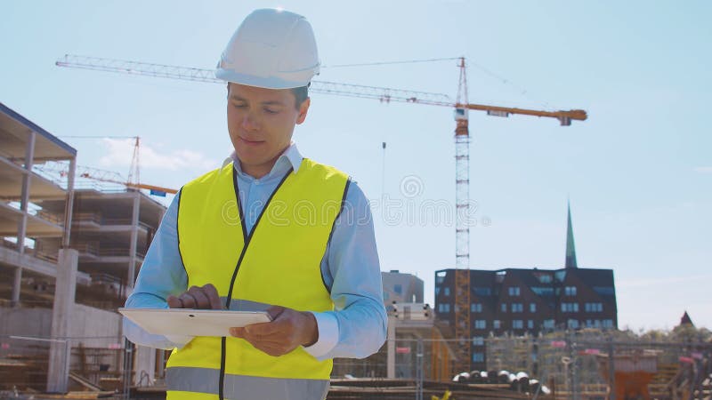 Professional Builder Standing in Front of Construction Site. Foreman in ...