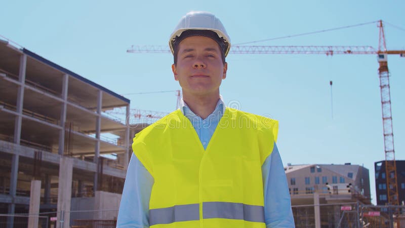 Professional Builder Standing in Front of Construction Site. Foreman in ...