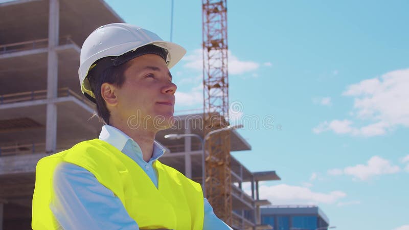 Professional Builder Standing in Front of Construction Site. Foreman in ...
