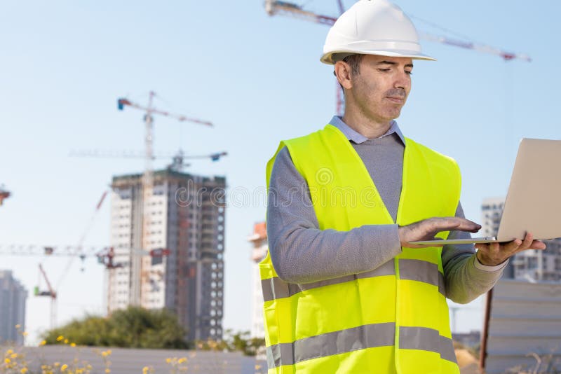 Professional Builder Standing with a Notebook Stock Image - Image of ...
