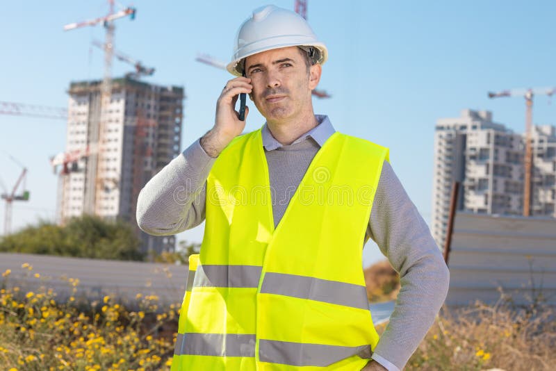 Professional Builder Standing Talking on a Phone Stock Photo - Image of ...