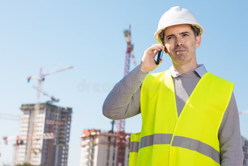 Professional Builder Standing Talking on a Phone Stock Image - Image of ...