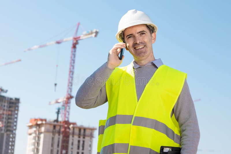 Professional Builder Standing Talking on a Phone Stock Image - Image of ...