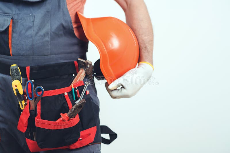 Professional Builder with Tools. Handyman with a Tool Belt. House ...