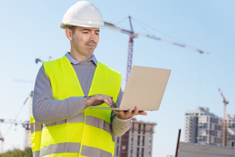 Professional Builder Typing on Computer Stock Photo - Image of concrete ...