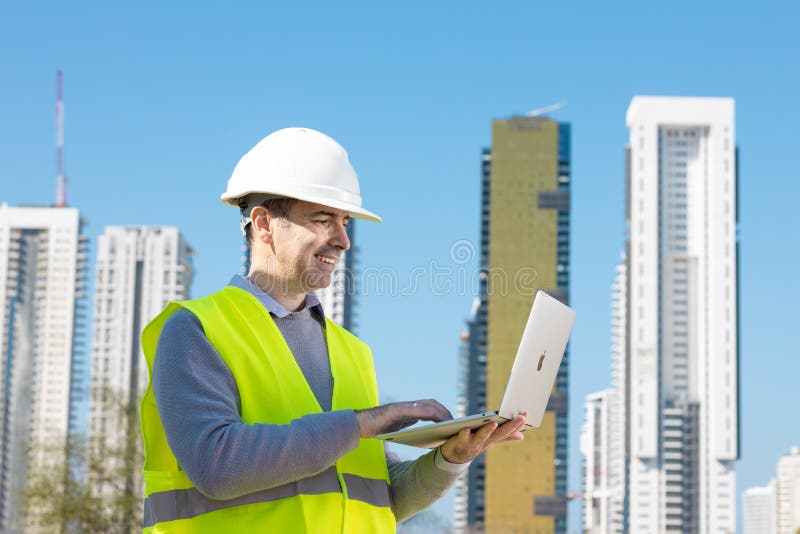 Professional Builder Typing on Computer Stock Image - Image of crane ...