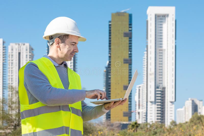 Professional Builder Typing on Computer Stock Photo - Image of male ...
