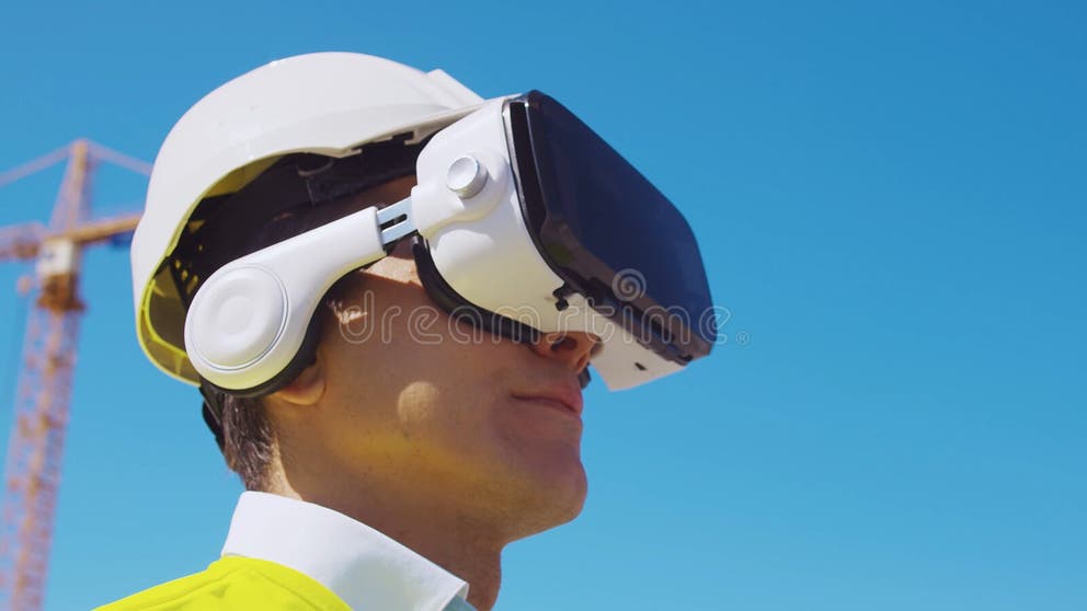Professional Builder in VR Helmet Standing in Front of Construction ...