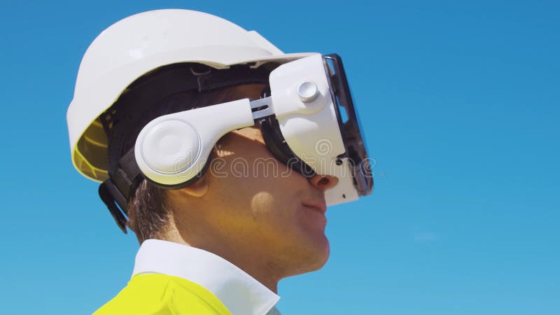 Professional Builder in VR Helmet Standing in Front of Construction ...