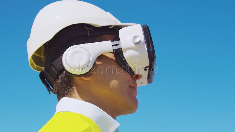 Professional Builder in VR Helmet Standing in Front of Construction ...