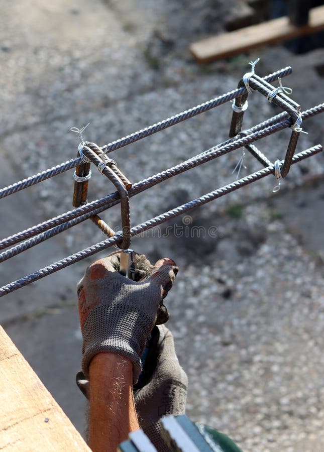 Hand Holding Reinforcement Steel. Professional Construction Worker ...
