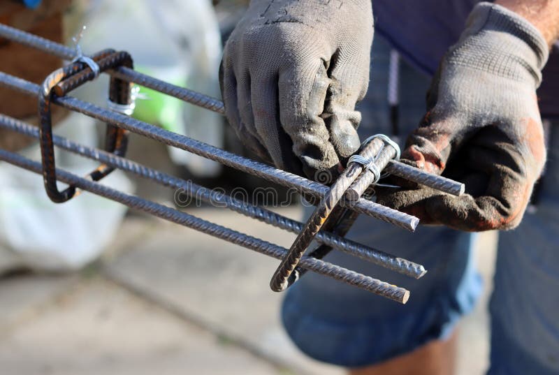Hand Holding Reinforcement Steel. Professional Construction Worker ...