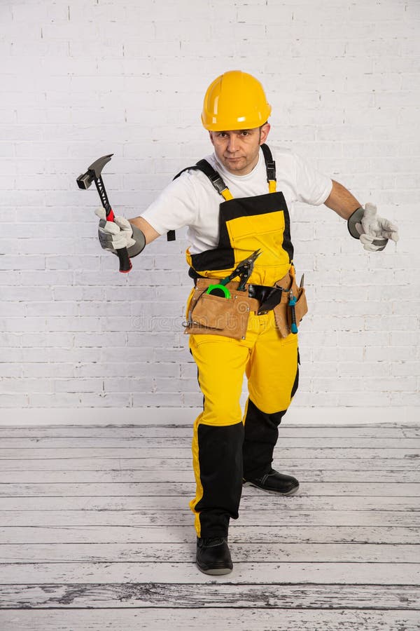 A Professional Building Fitter Ready for Action at Any Time Stock Photo ...