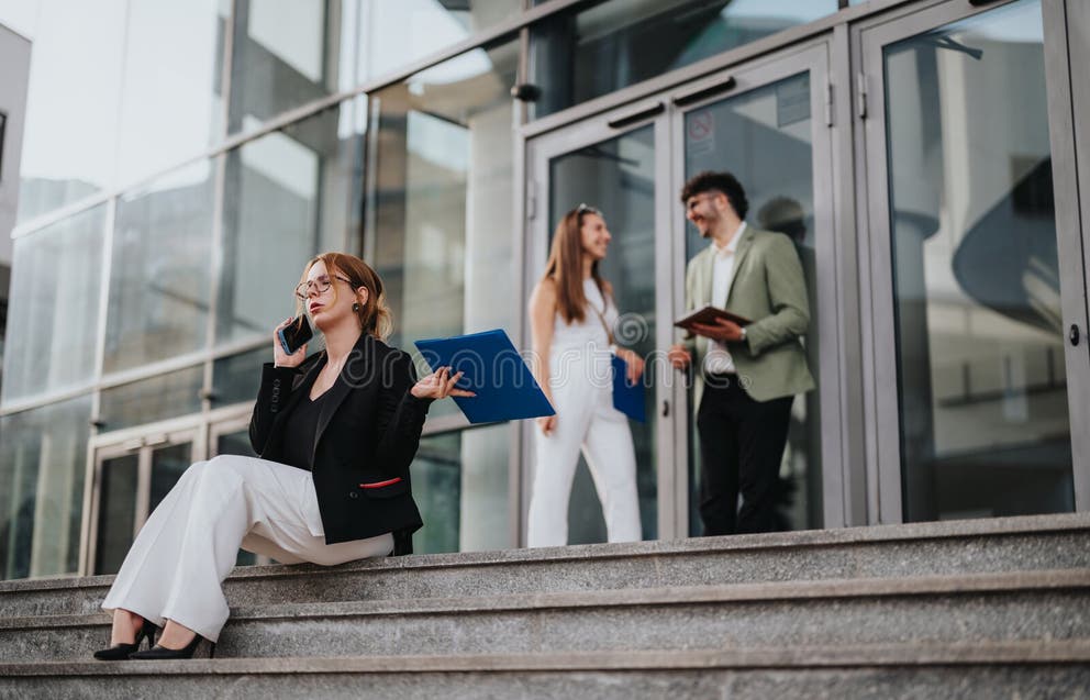 Professional Business People Interacting Outside Modern Office Building ... Professional Business People Interacting Outside Modern Office Building ...