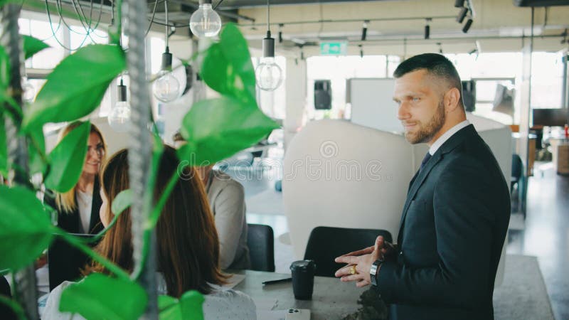 A Professional Business Team in a Contemporary Office Collaborates on ...