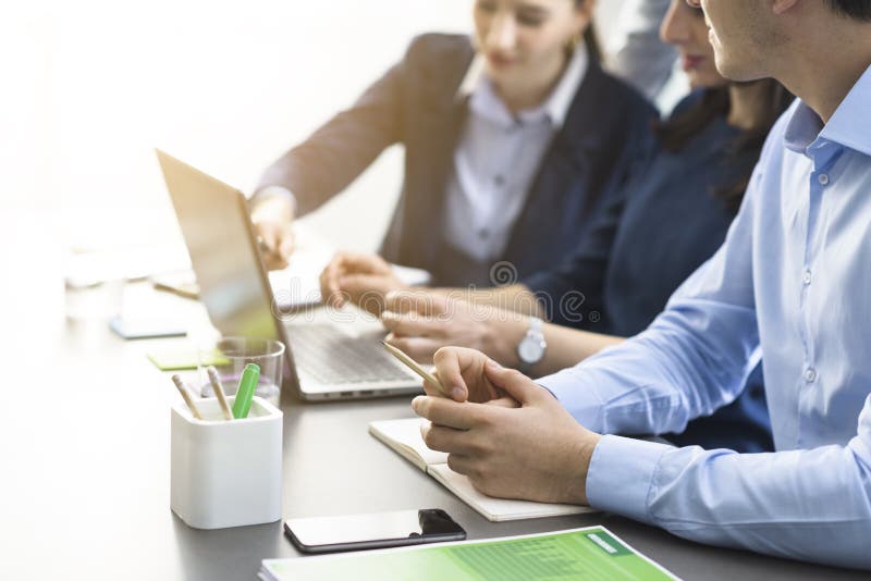 Professional Business Team Working Together at Desk Stock Image - Image ...