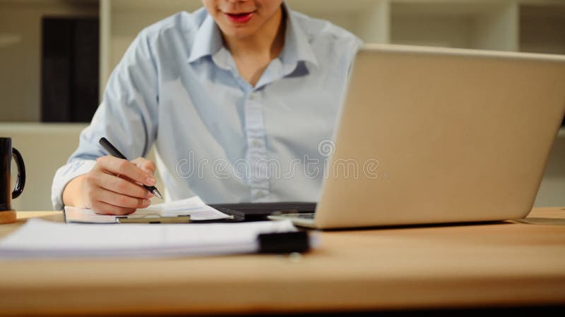 Professional Businessman Examining Report at Office Desk Stock Image ...