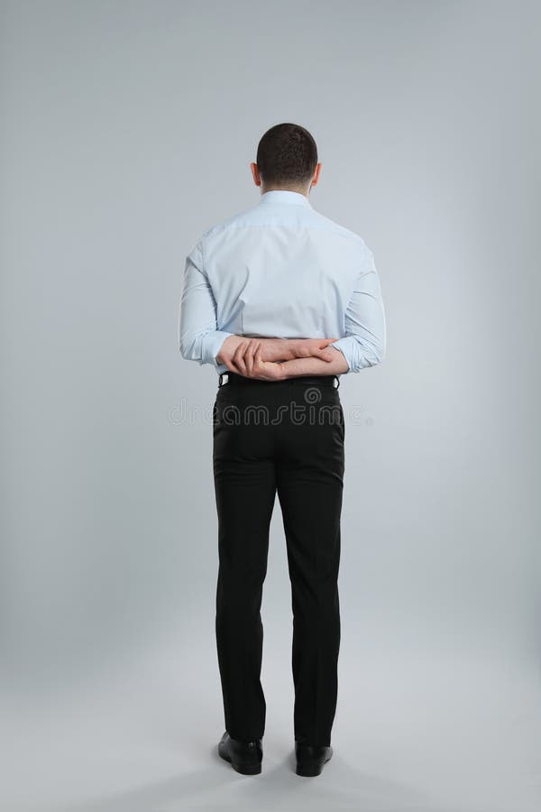 Professional Businessman on Grey Background, Back View Stock Image ...