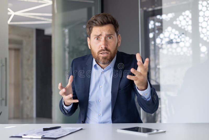 Businessman Explaining Passionately in Modern Office Stock Photo ...
