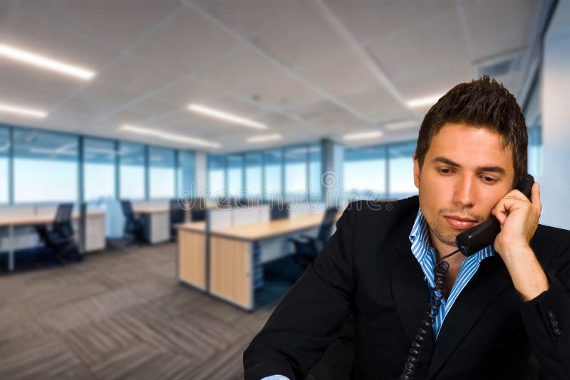 Professional Businessman Using Phone in Office Stock Photo - Image of ...