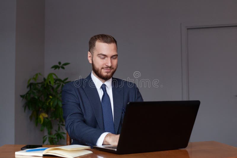 Professional Businessman is Working on New Project on His Computer ...